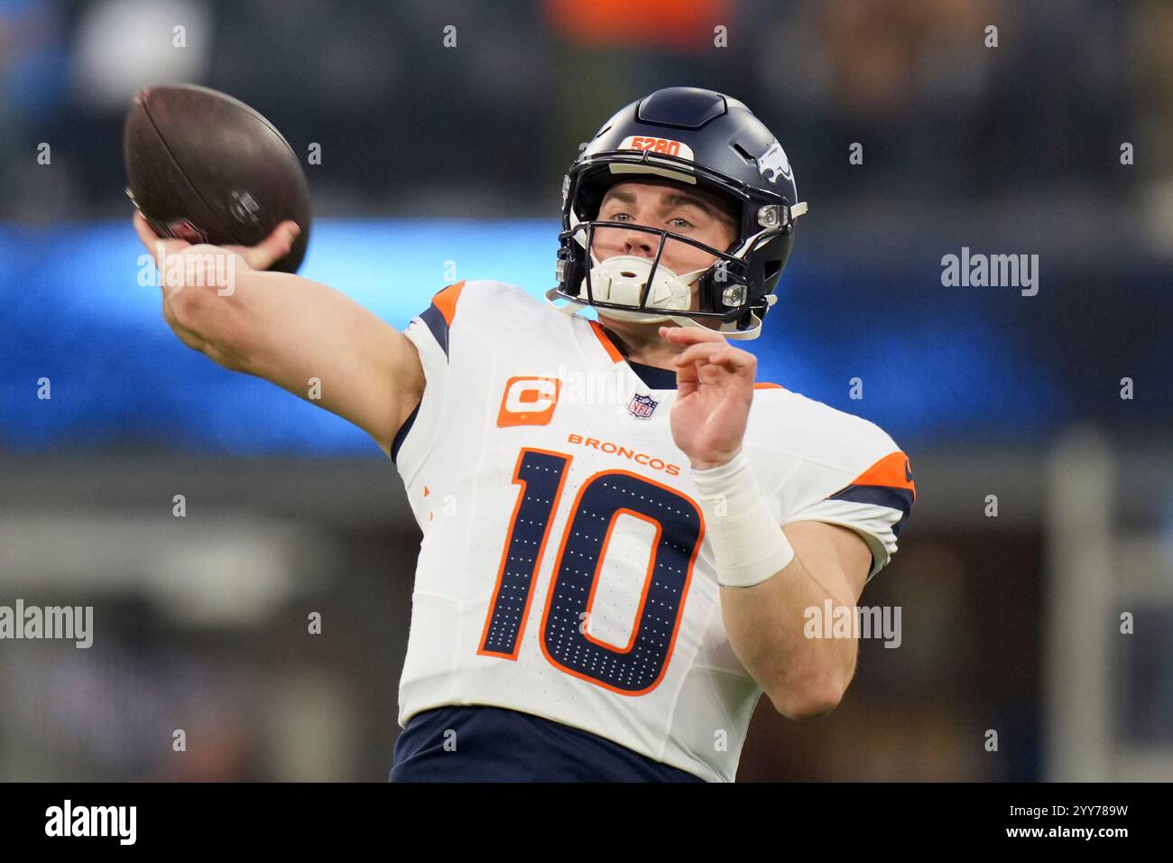 Denver Broncos quarterback Bo Nix (10) warms up before an NFL football ...