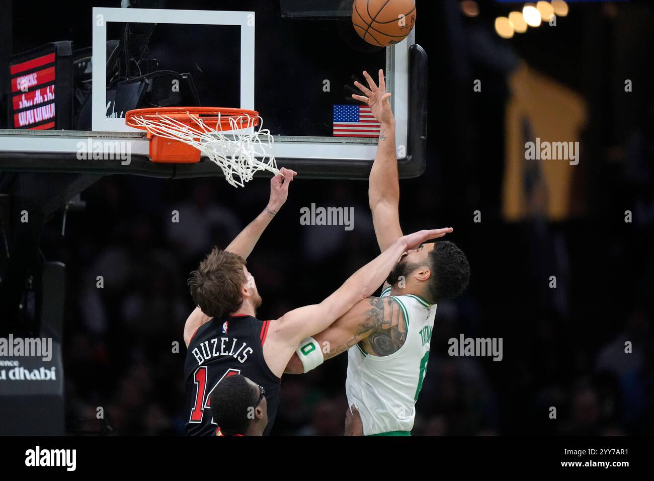 Boston Celtics forward Jayson Tatum (0) takes a shot at the basket as ...