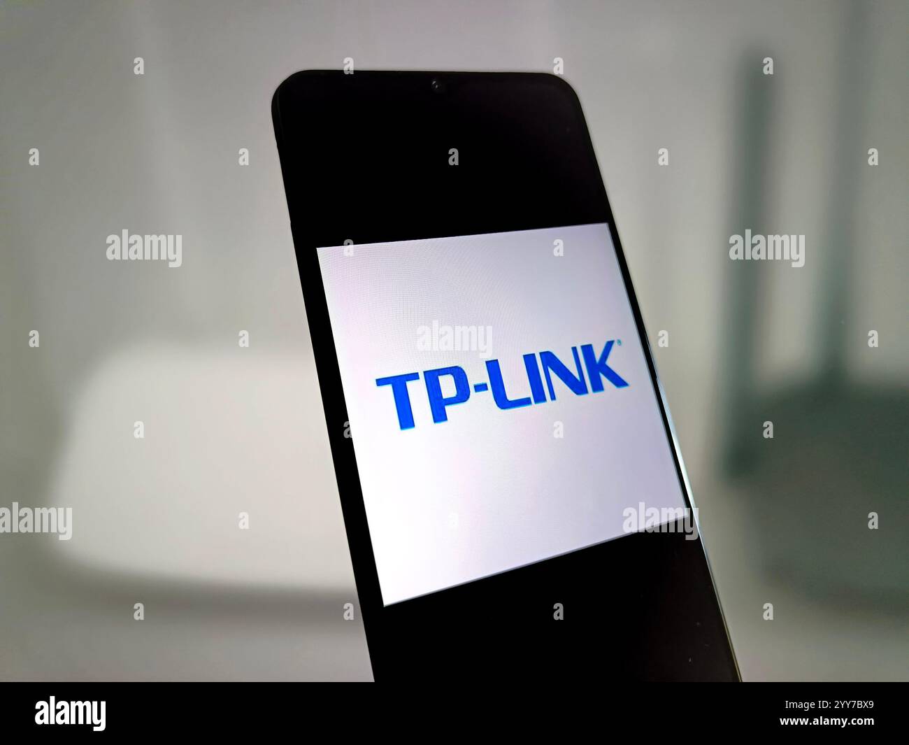 SUQIAN, CHINA - DECEMBER 20, 2024 - An illustration shows the TP-Link ...