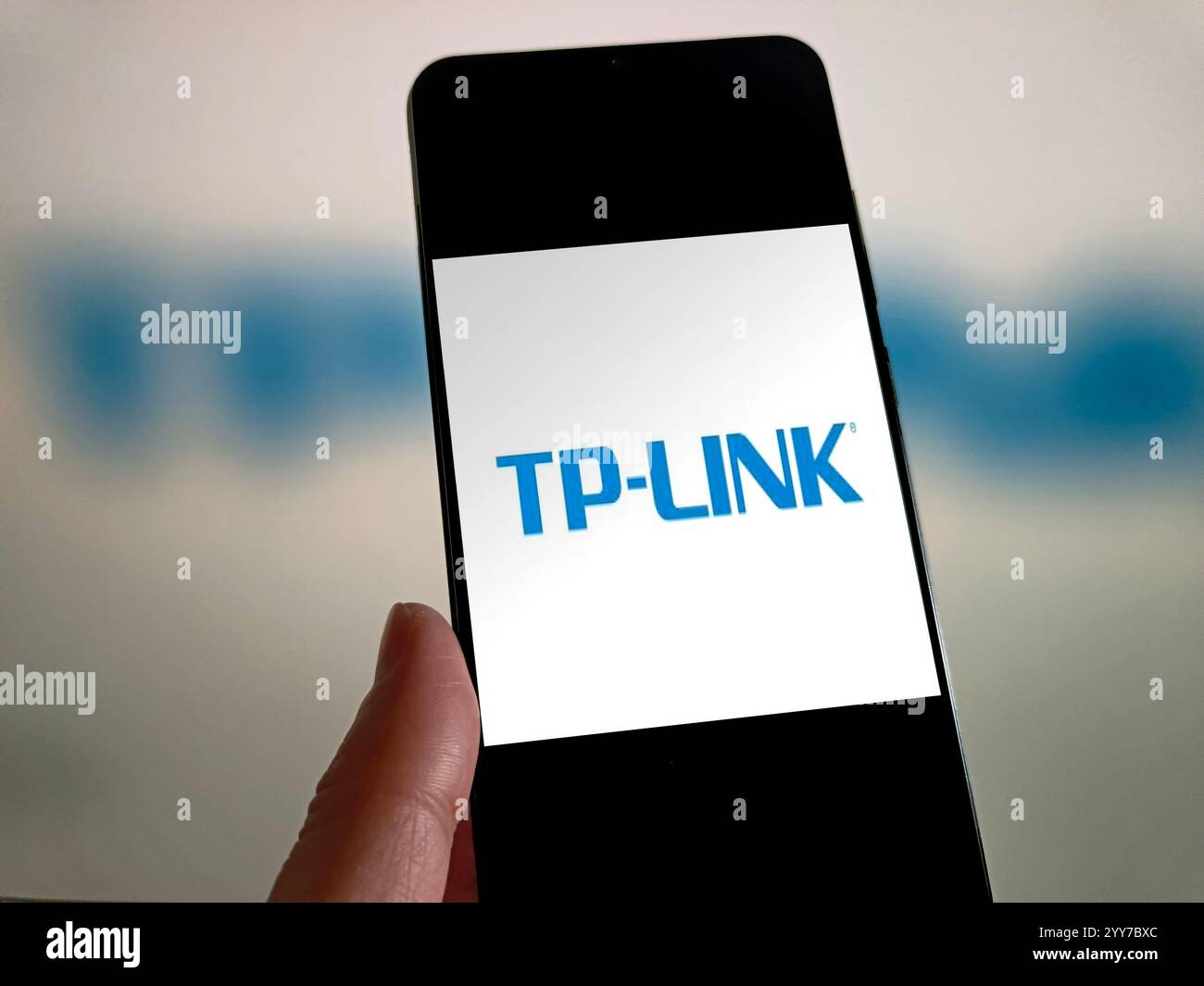 SUQIAN, CHINA - DECEMBER 20, 2024 - An illustration shows the TP-Link ...