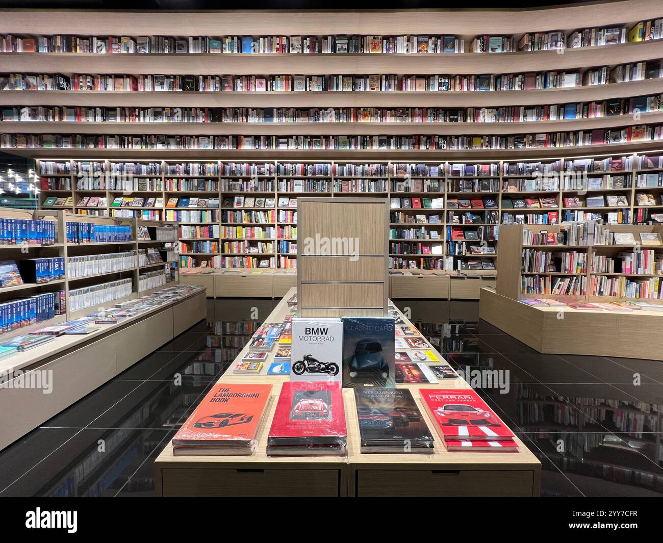 Interior of Tsutaya Bookstore, unique design aesthetic, high shelves ...