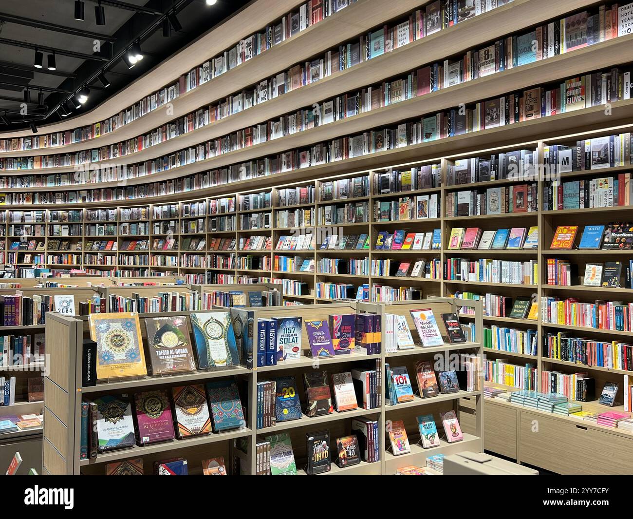 Interior of Tsutaya Bookstore, unique design aesthetic, high shelves ...