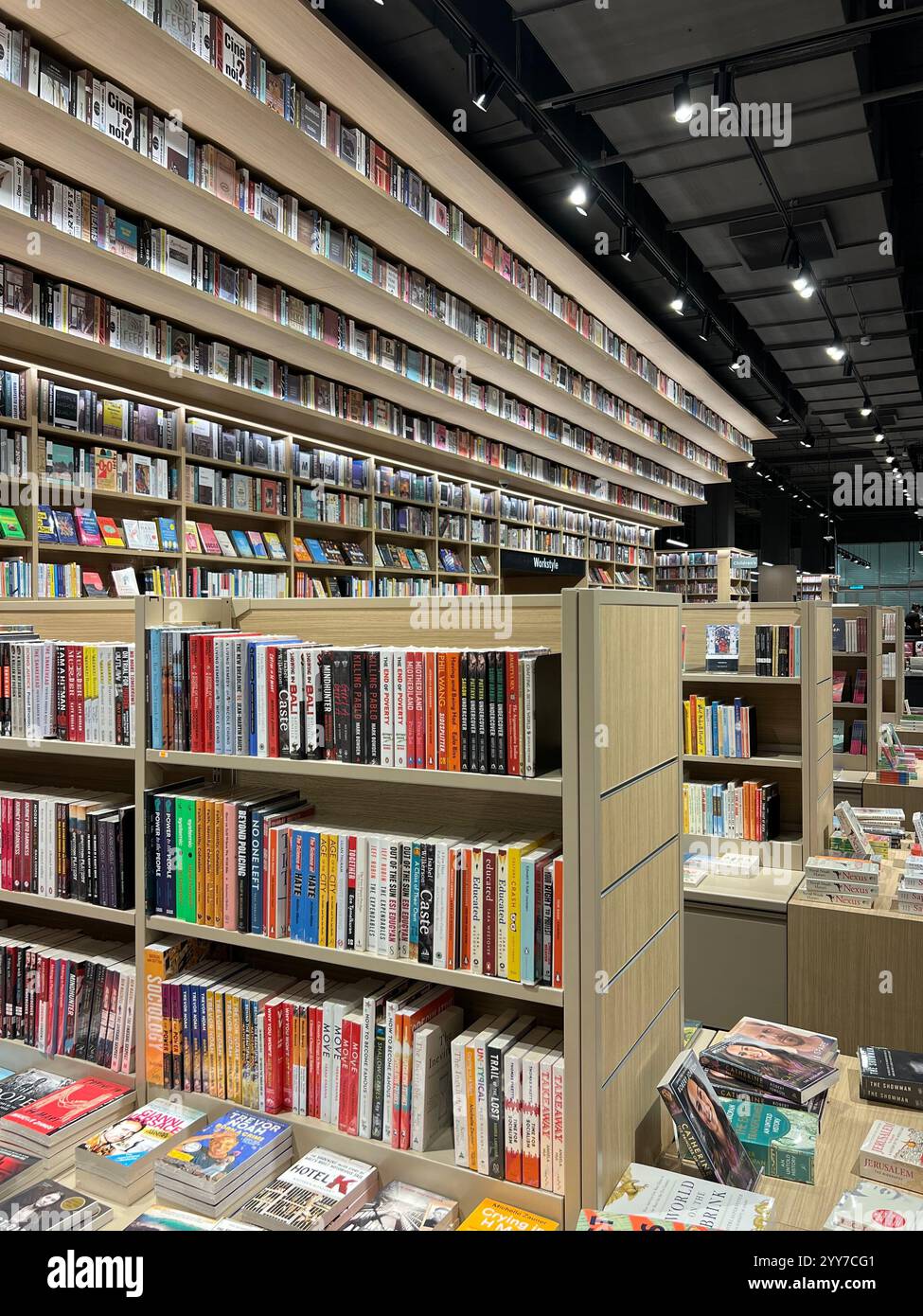 Interior of Tsutaya Bookstore, unique design aesthetic, high shelves ...