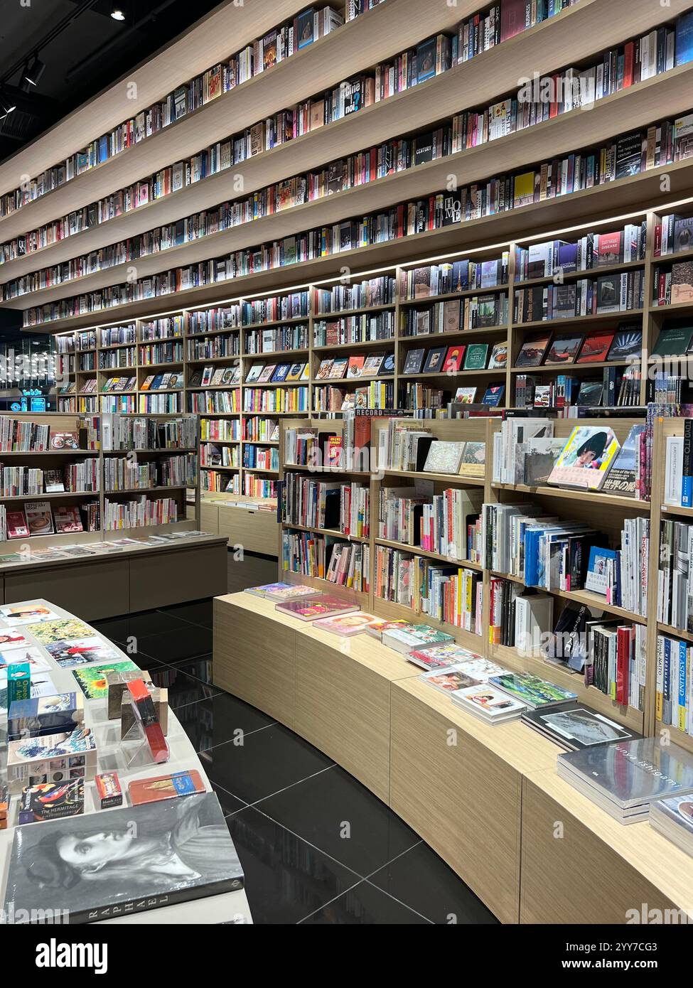Interior of Tsutaya Bookstore, unique design aesthetic, high shelves ...
