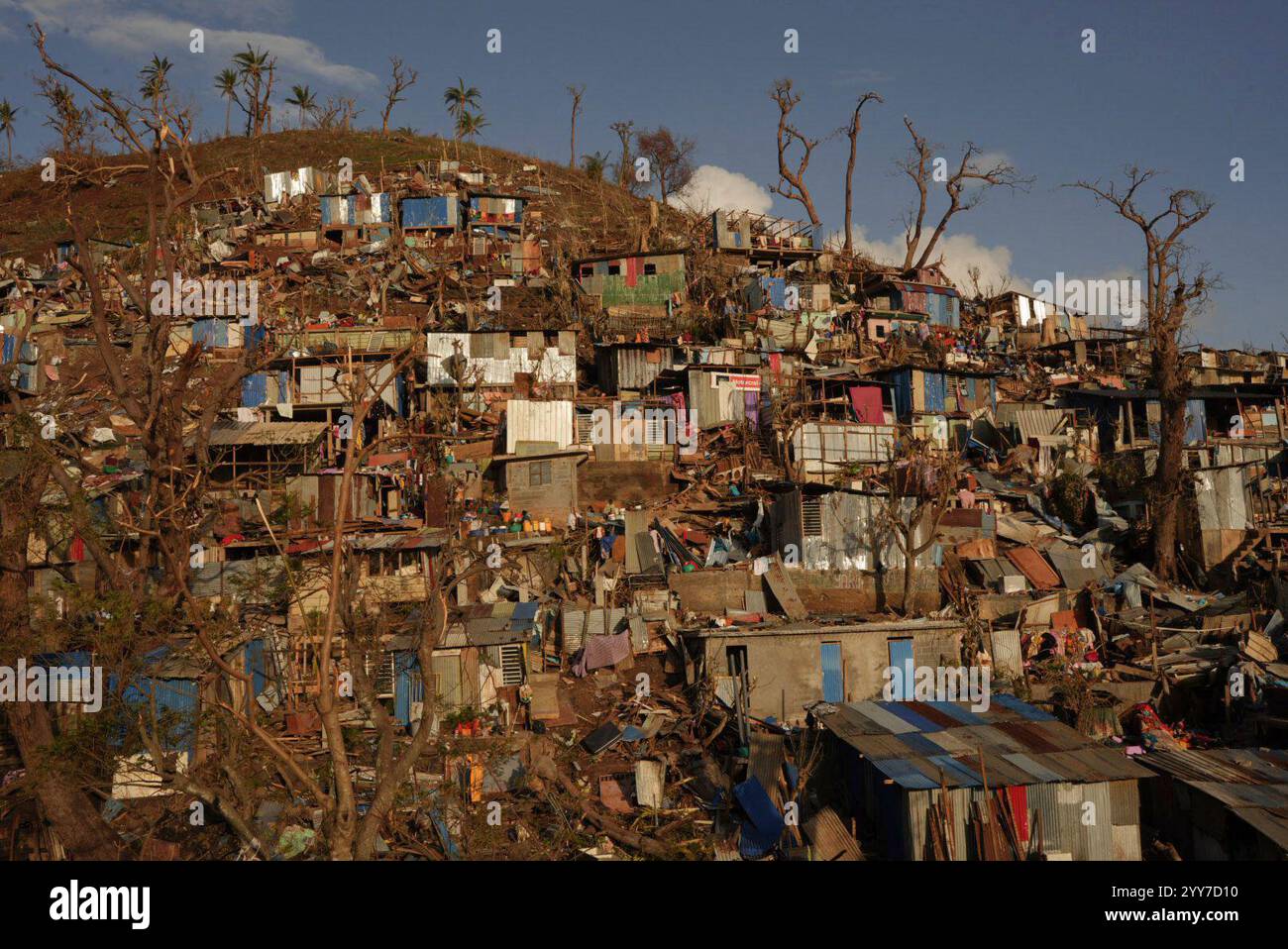 Damage is seen in the Kaweni slum, on the outskirts of Mamoudzou, in ...
