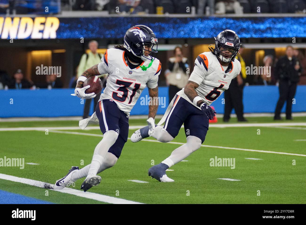 Denver Broncos cornerback Kris Abrams-Draine (31) runs back with an ...