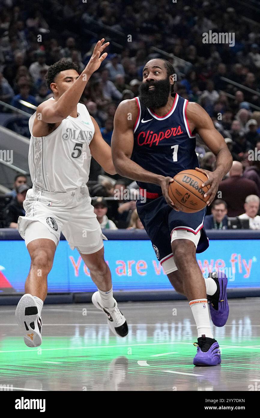Los Angeles Clippers guard James Harden (1) drives to the basket as ...