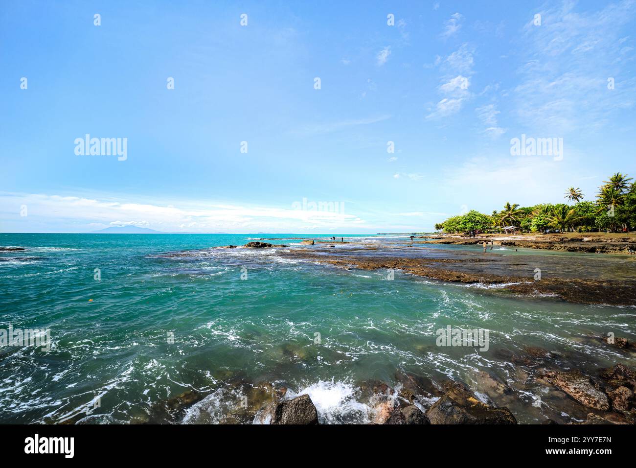 Tranquil Coastal Scene with Soft Water Effect. Bright Blue Sea ...