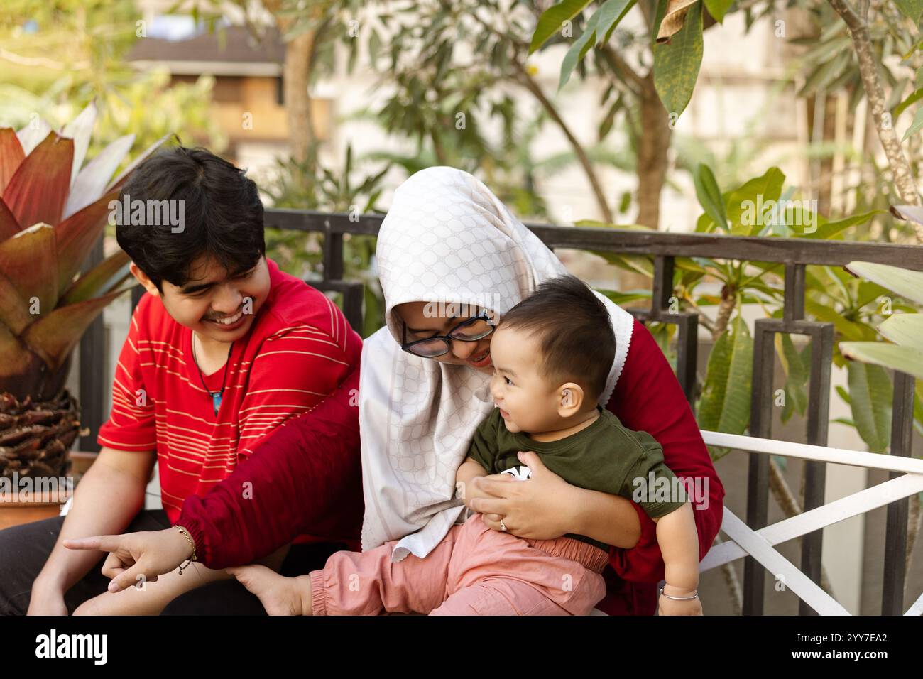 Joyful Parents Enjoying Time with Their Baby Son. Happy Small Family ...