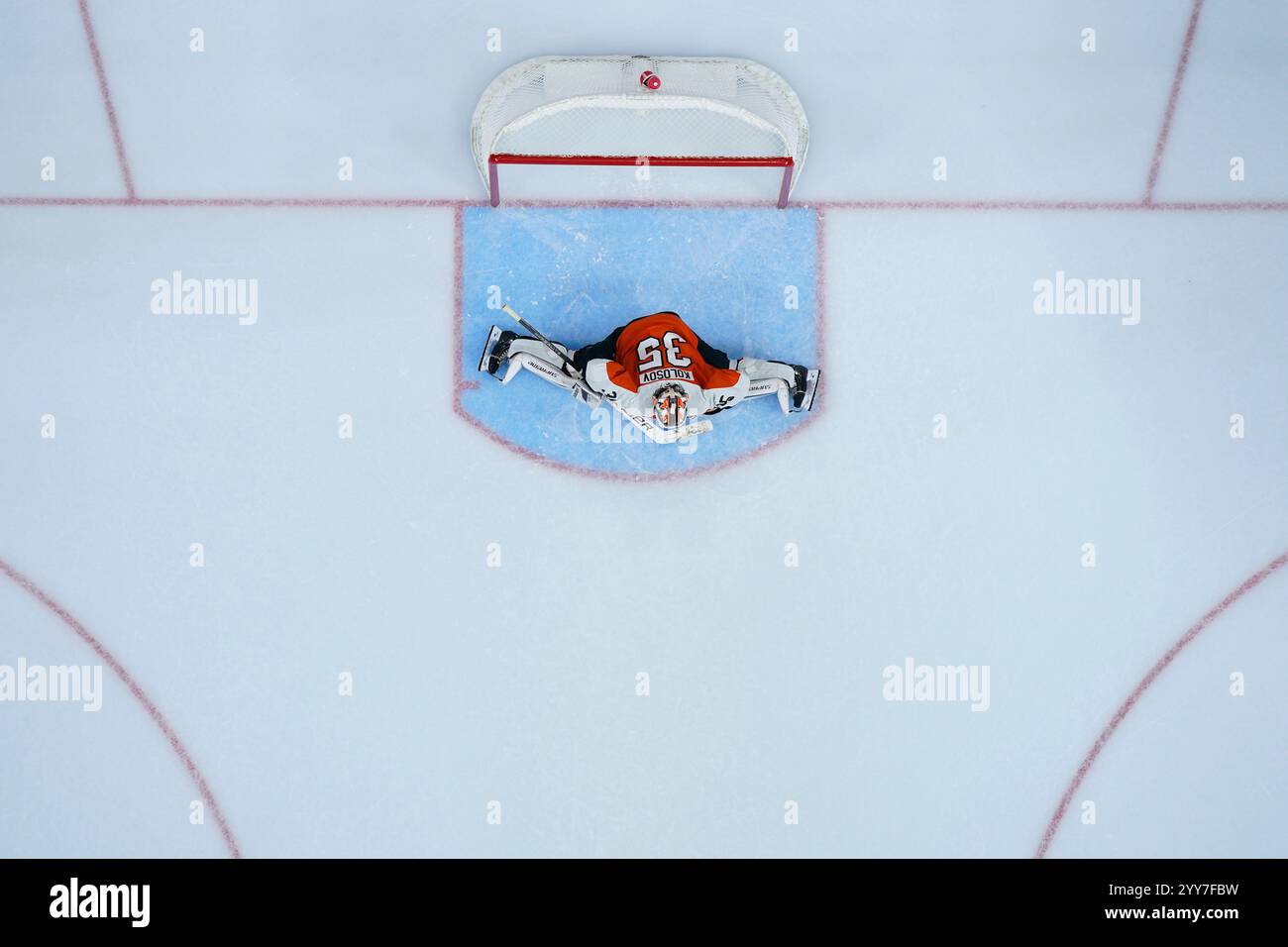 Philadelphia Flyers' Aleksei Kolosov stretches plays during an NHL ...
