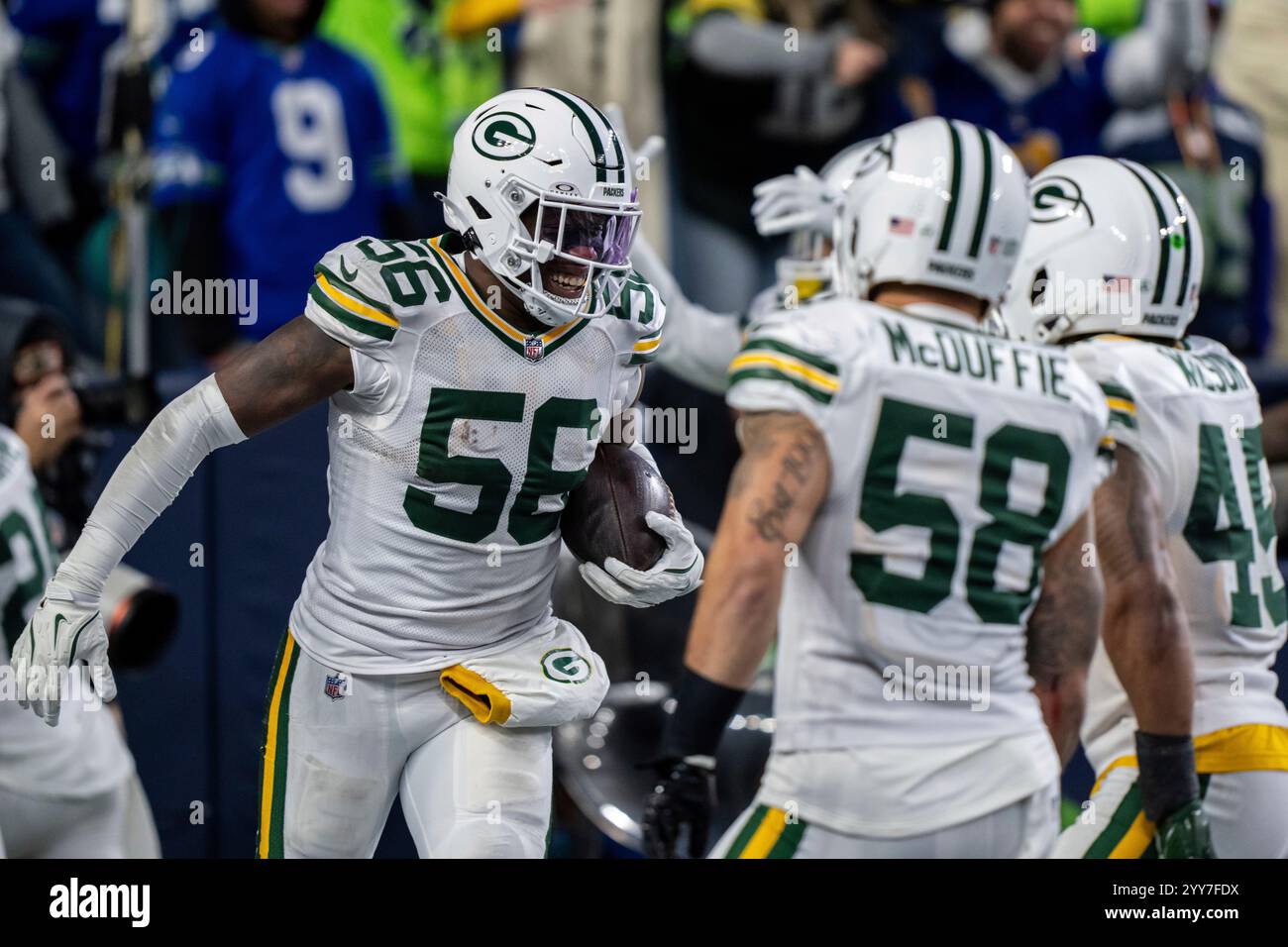 Green Bay Packers linebacker Edgerrin Cooper celebrates with linebacker ...