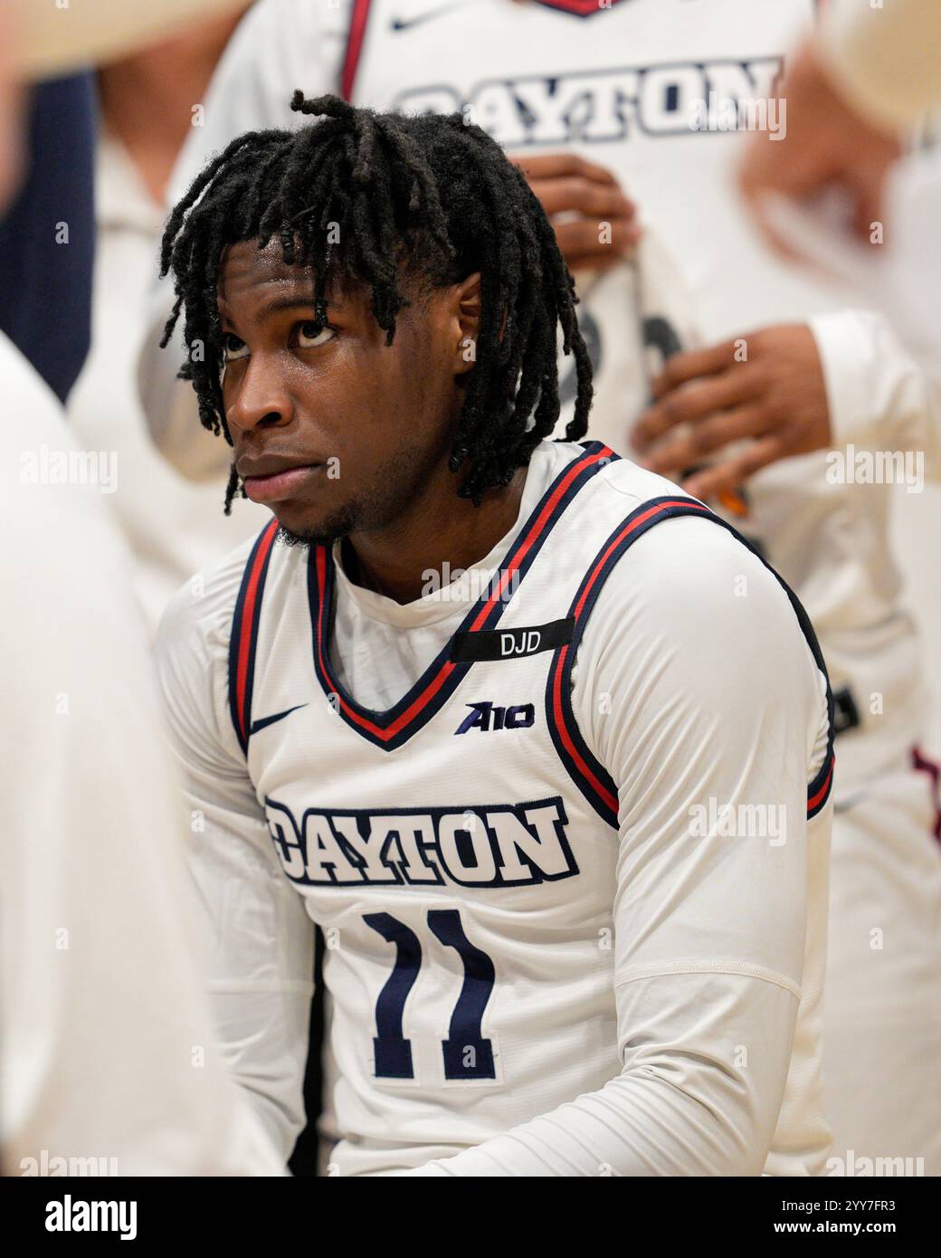 Dayton guard Malachi Smith (11) sits in the huddle during an NCAA ...