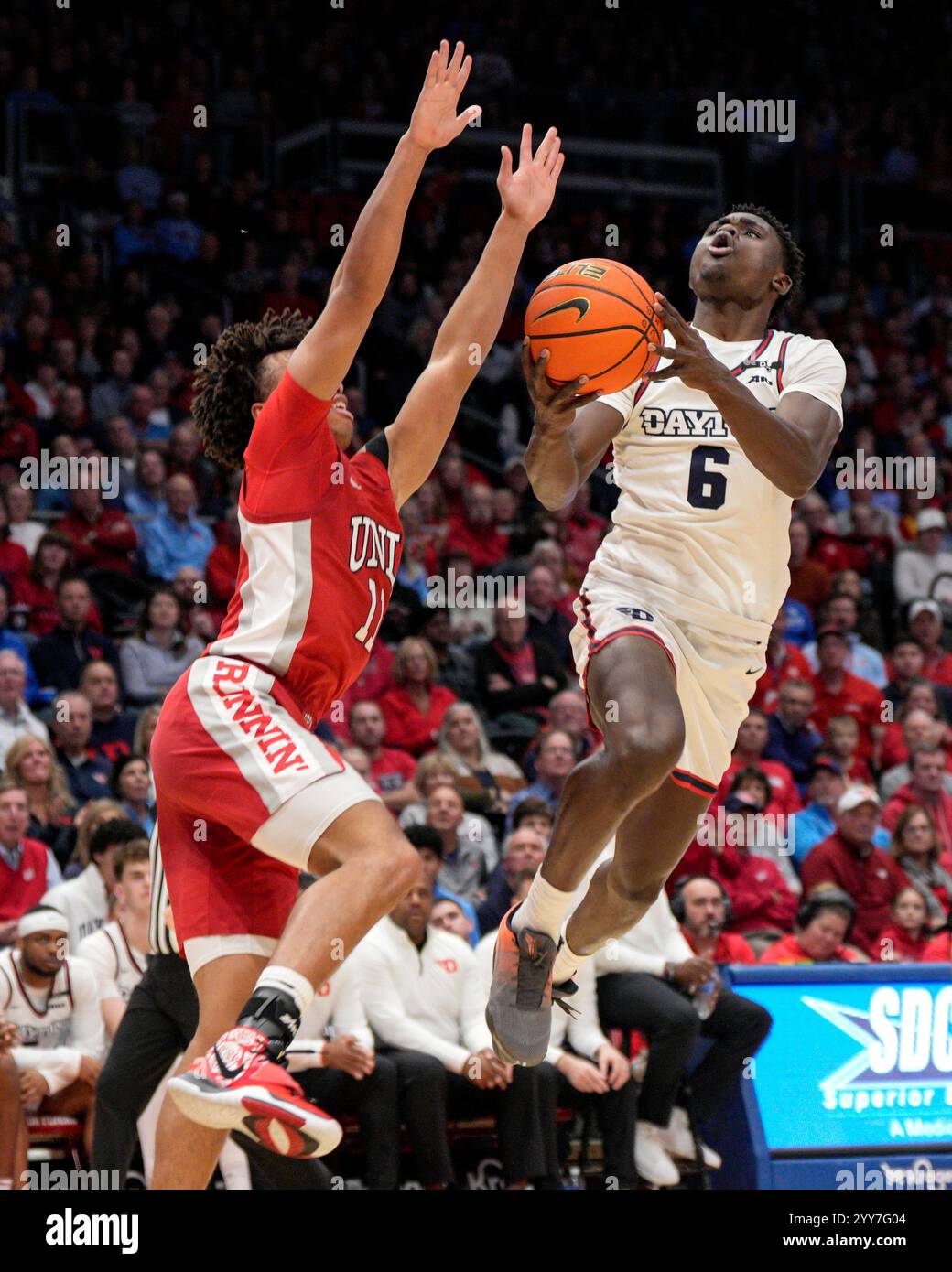 Dayton guard Enoch Cheeks (6) shoots against UNLV guard Dedan Thomas Jr ...
