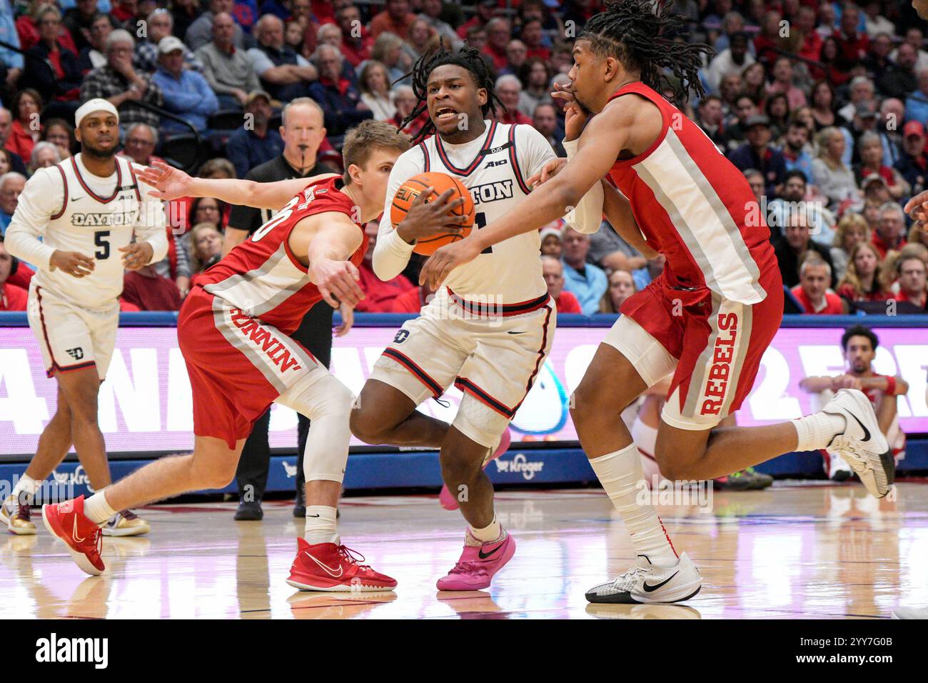 Dayton guard Malachi Smith (11) drives against UNLV's Jeremiah Cherry ...