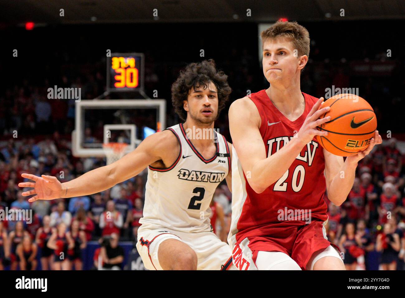 UNLV guard Julian Rishwain (20) controls the ball against Dayton ...