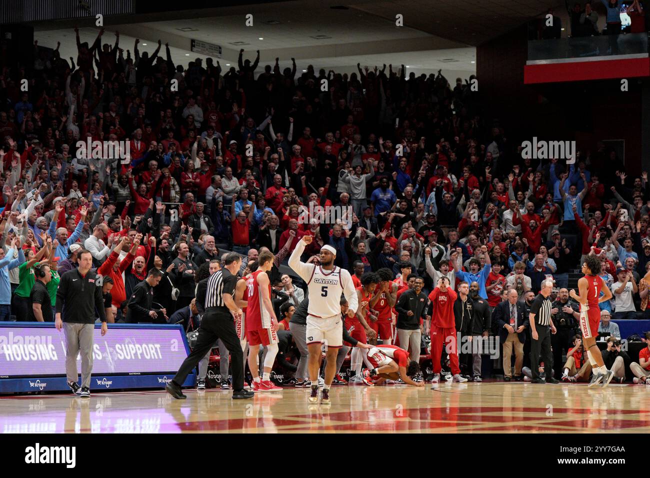 Dayton's Malachi Smith (11) celebrates with teammate Posh Alexander (5 ...