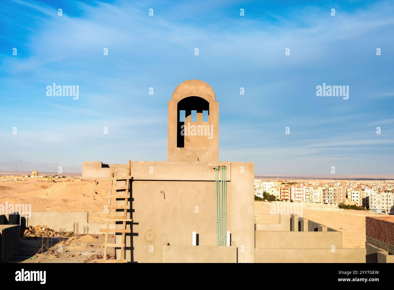 Captivating image of a traditional desert structure set against an ...