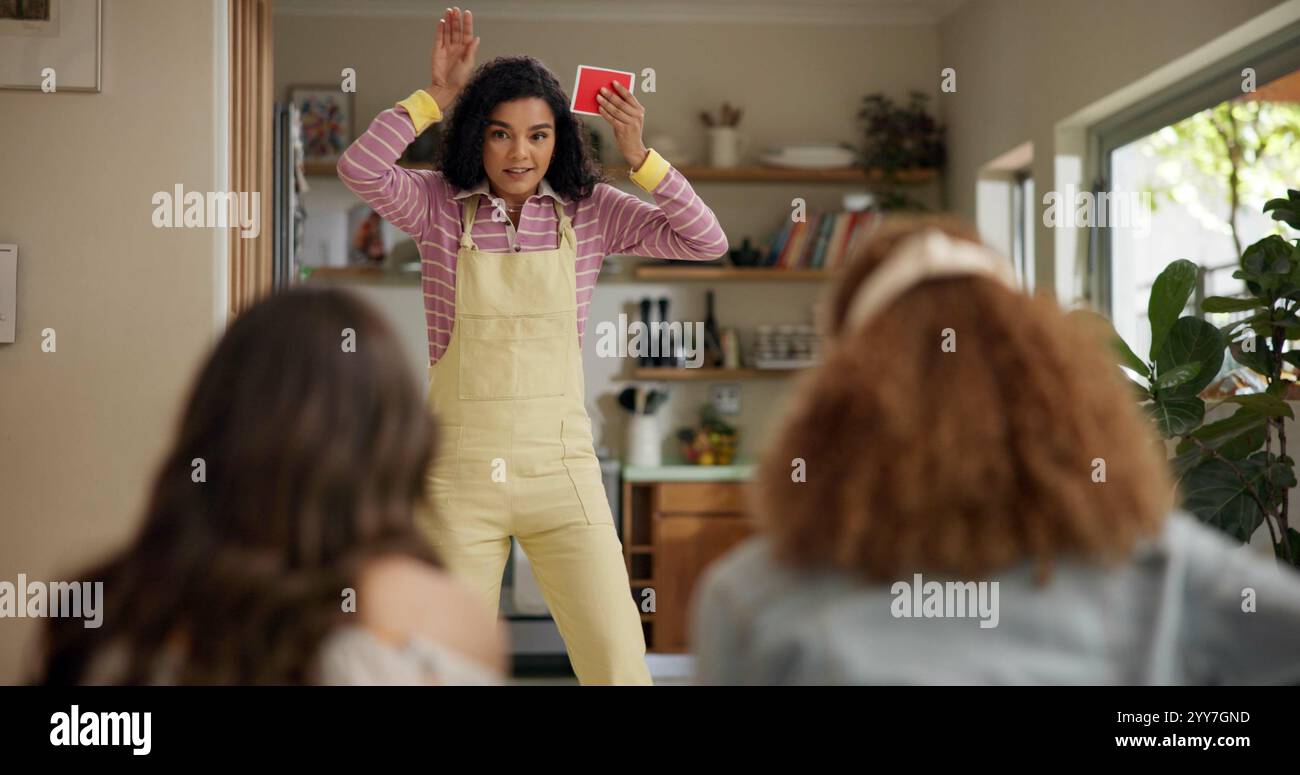 Woman, acting and games in home with friends for entertainment, fun and ...