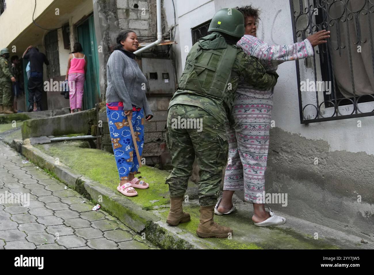 Soldiers search women as they patrol the south side of Quito, Ecuador ...