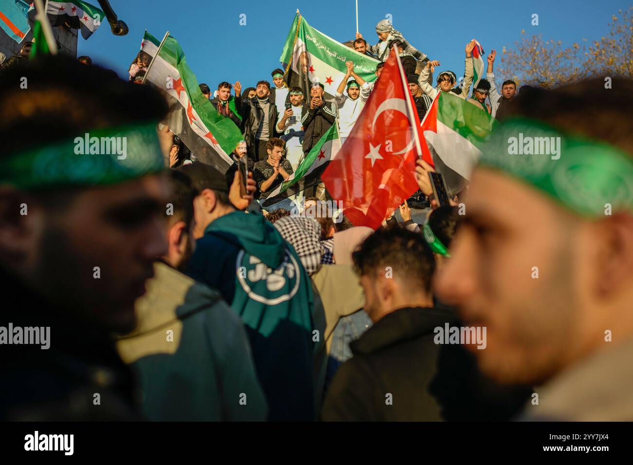 People gather to celebrate the Syrian government's fall in Istanbul ...