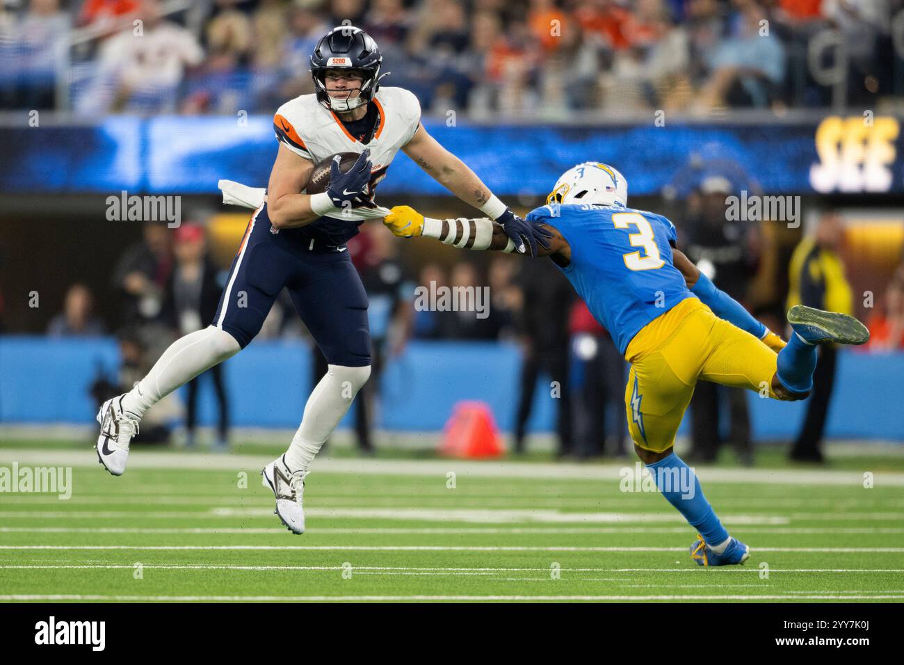 Denver Broncos tight end Nate Adkins (45) breaks off from Los Angeles ...