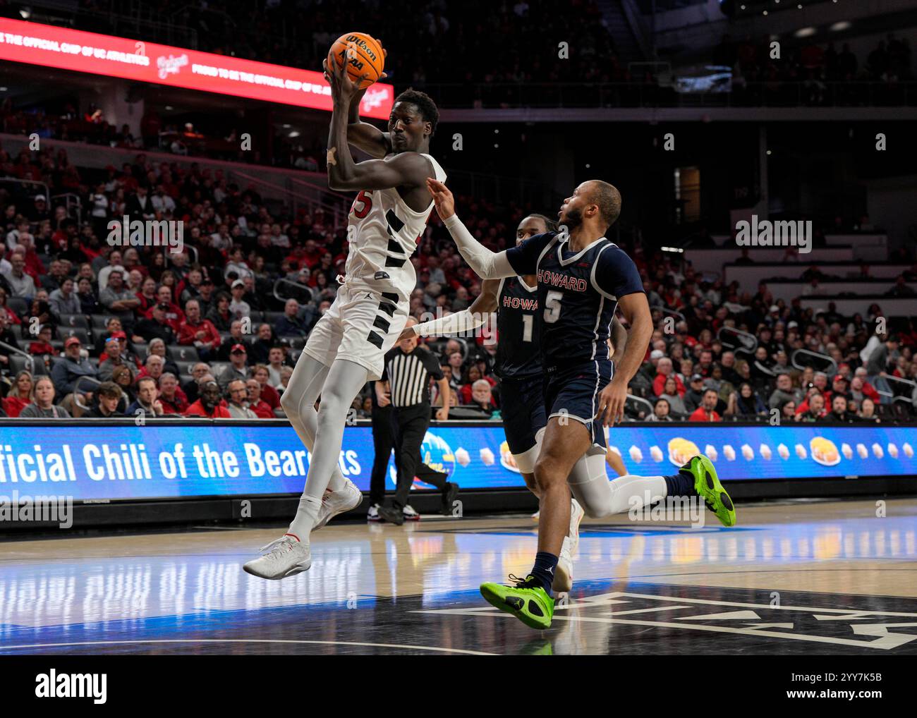 Cincinnati forward Aziz Bandaogo (55) battles against Howard guard ...