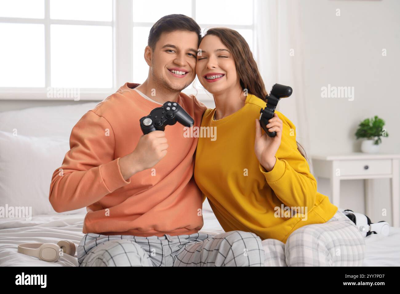 Family playing in game virtual hi-res stock photography and images - Alamy