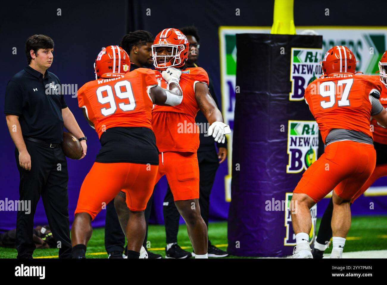 New Orleans, Louisiana, USA. 19th Dec, 2024. SHSU players warming up ...