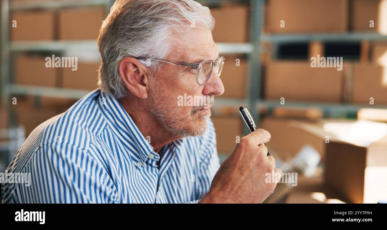 Man, business and thinking in warehouse for logistics, shipping plan ...