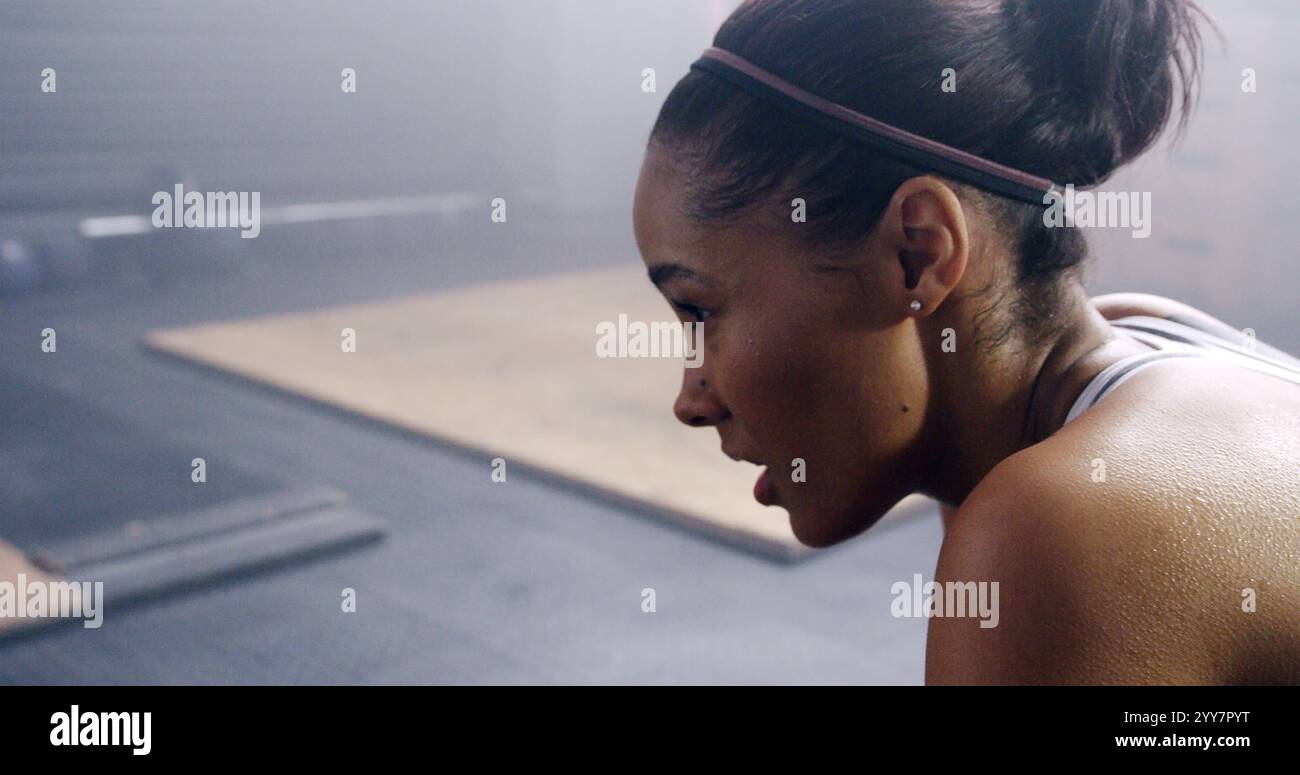Fitness, woman and tired of workout in gym with breathing, exercise ...
