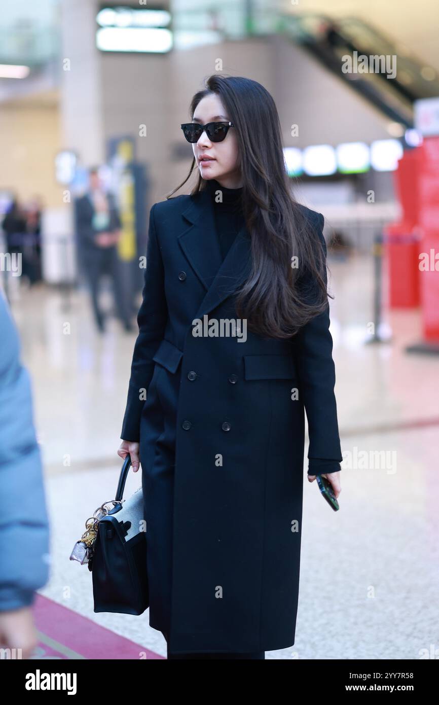 Chinese actress Wang Ziwen appears at the airport in Shanghai, China ...