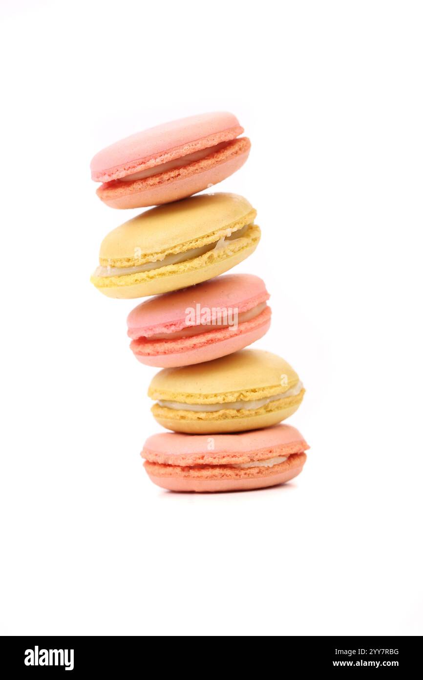 Stack of macaron cakes. Close up. White background Stock Photo - Alamy
