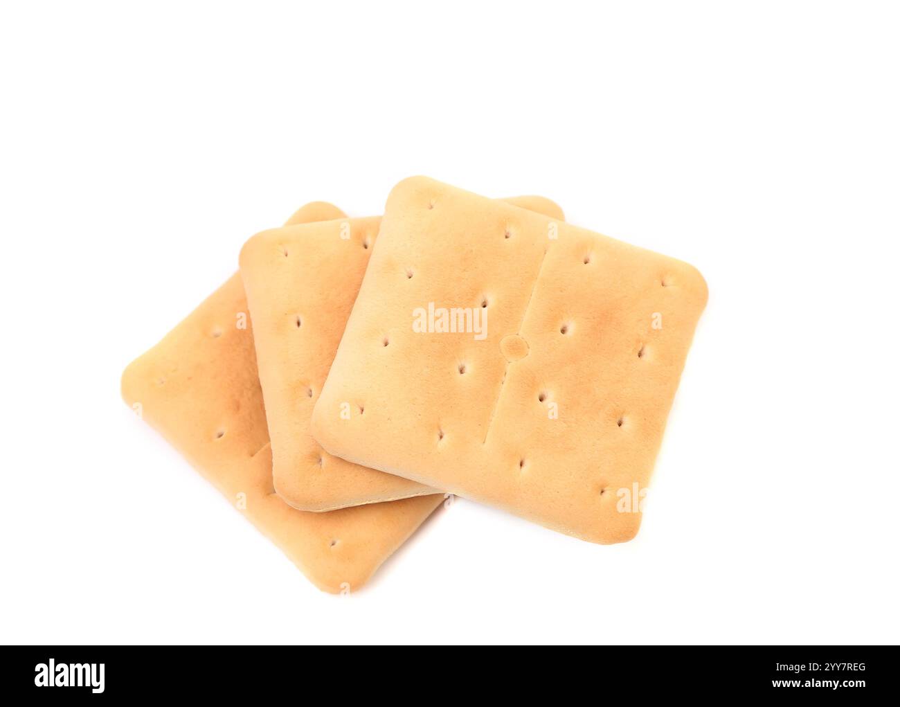 Several saltine soda crackers. Close up. White background Stock Photo ...