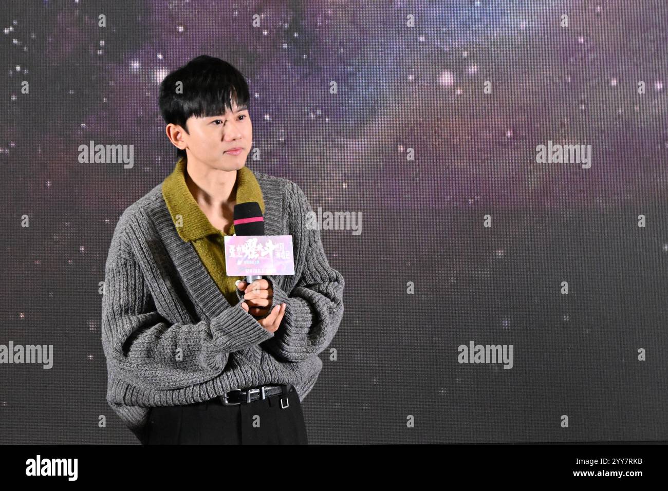 Chinese pop singer Jason Zhang attends an activity in Beijing, China ...