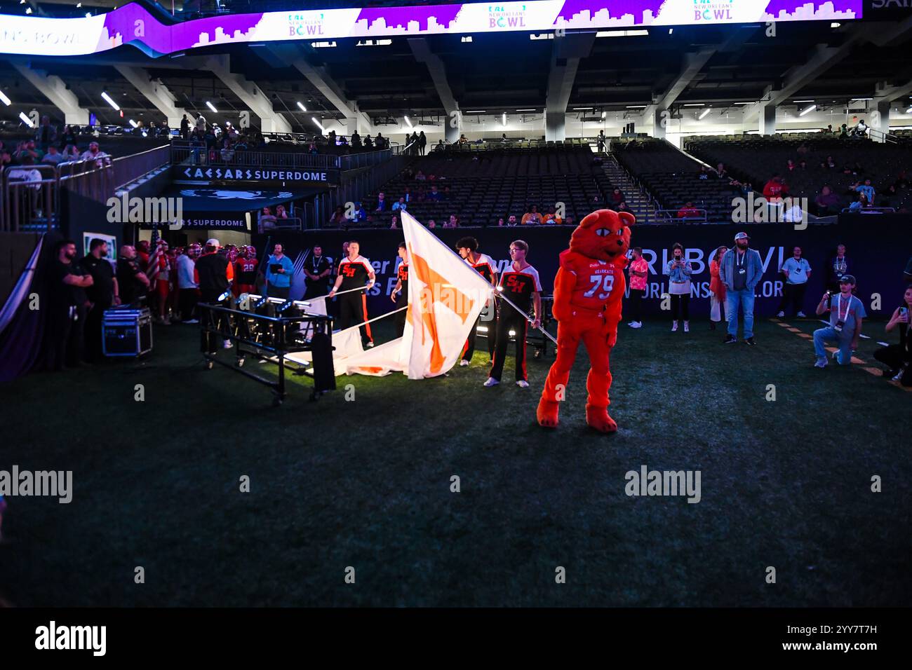 New Orleans, Louisiana, USA. 19th Dec, 2024. Sammy The Bearkat leading ...