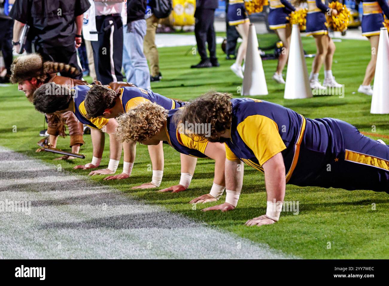 FRISCO, TX - DECEMBER 17: West Virginia Mountaineers cheerleaders do ...