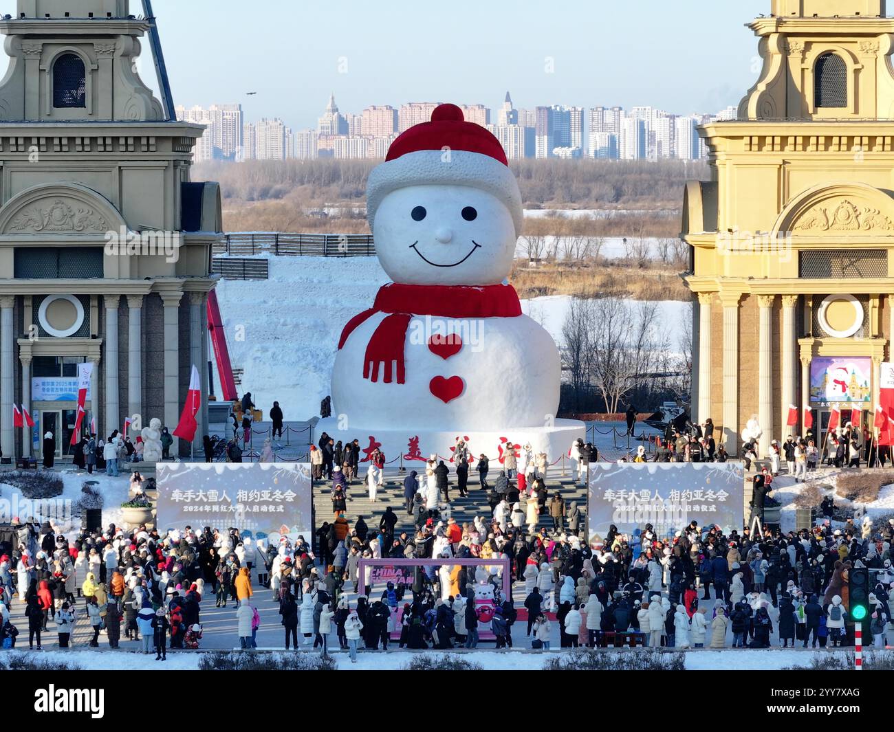 An iconic giant snowman welcomes visitors in Harbin City, northeast ...