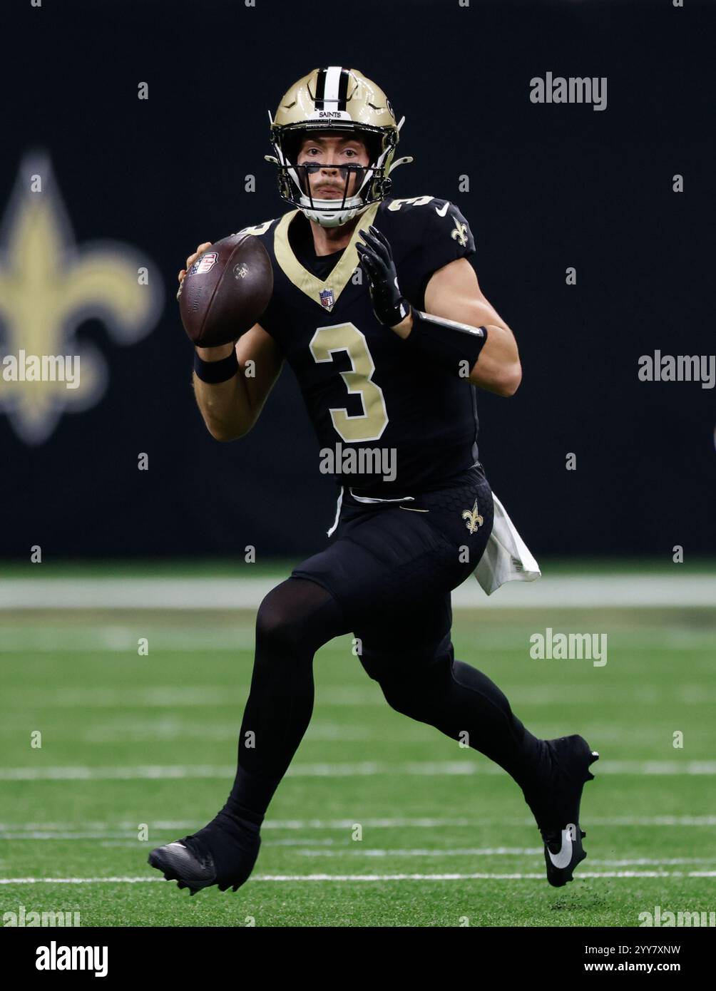 New Orleans Saints quarterback Jake Haener (3) searches for an open ...