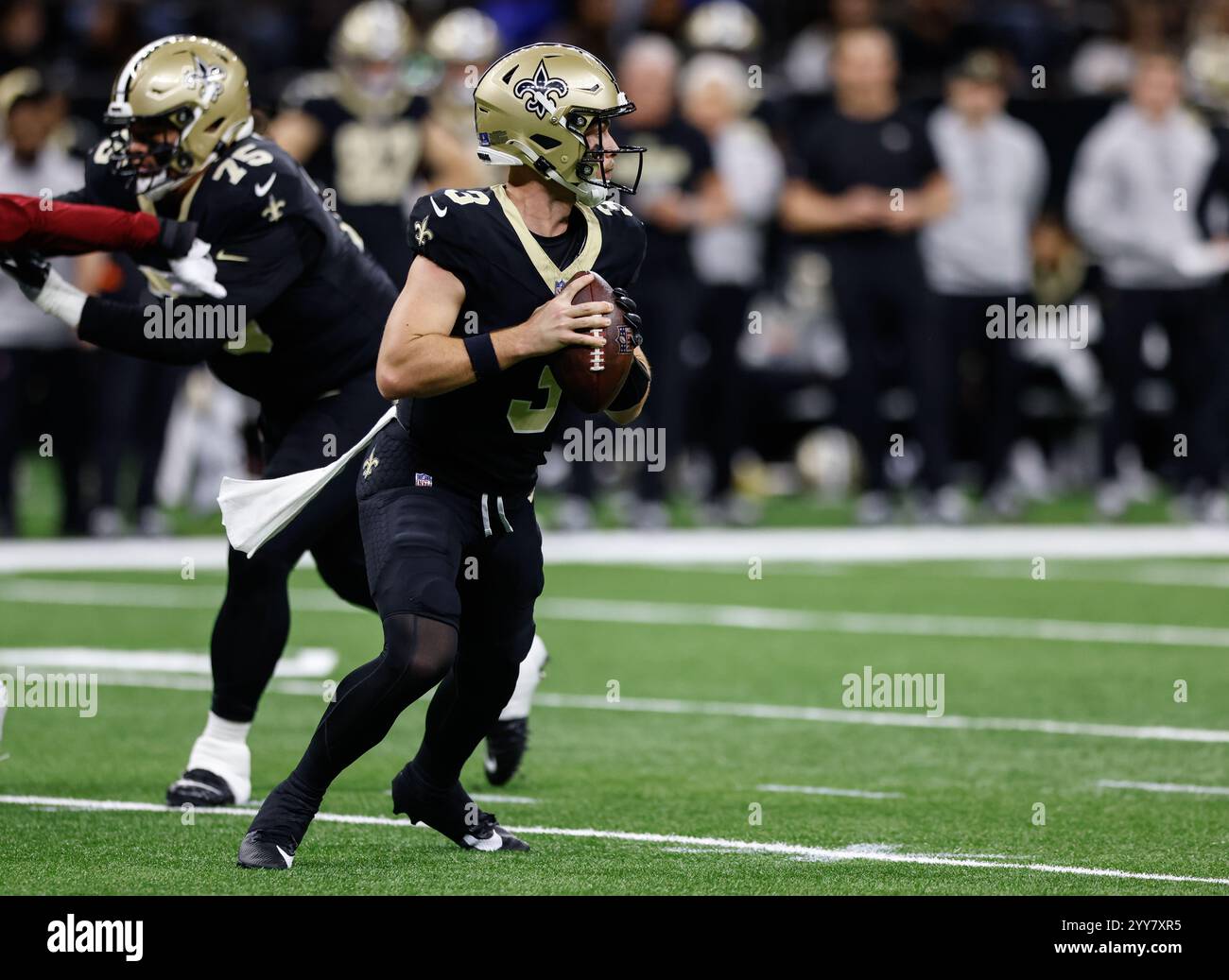 New Orleans Saints quarterback Jake Haener (3) searches for an intended ...
