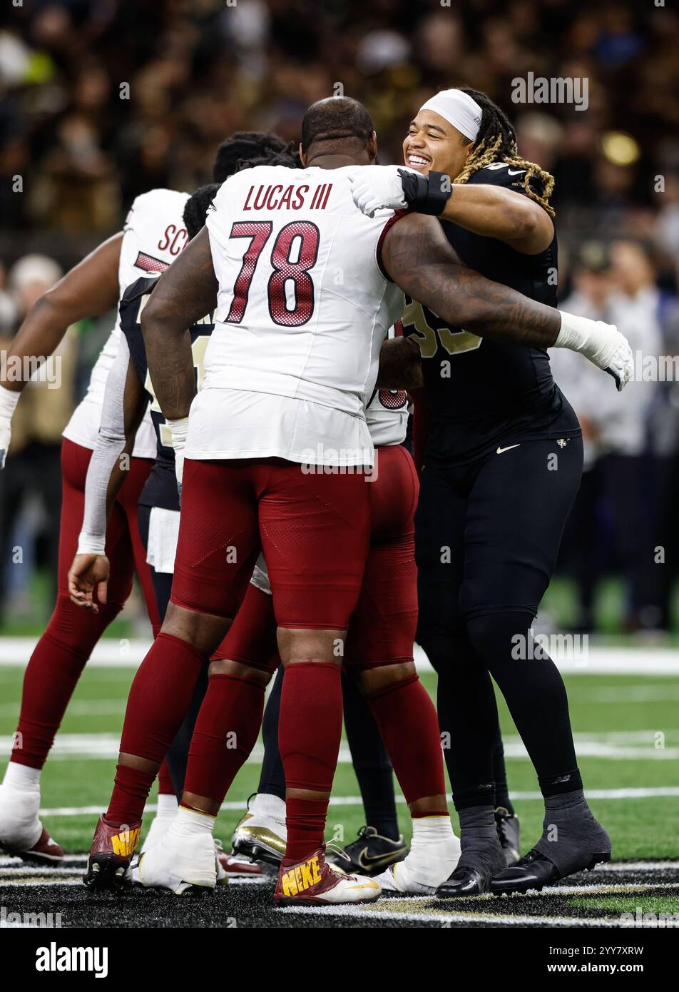 New Orleans Saints defensive end Chase Young (99) and Washington ...