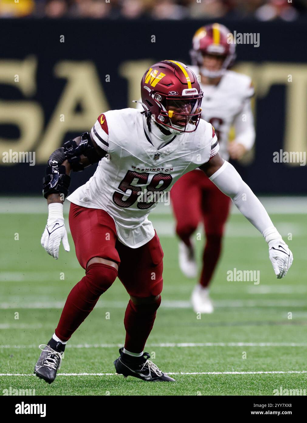 Washington Commanders linebacker Jordan Magee (58) in formation at the ...