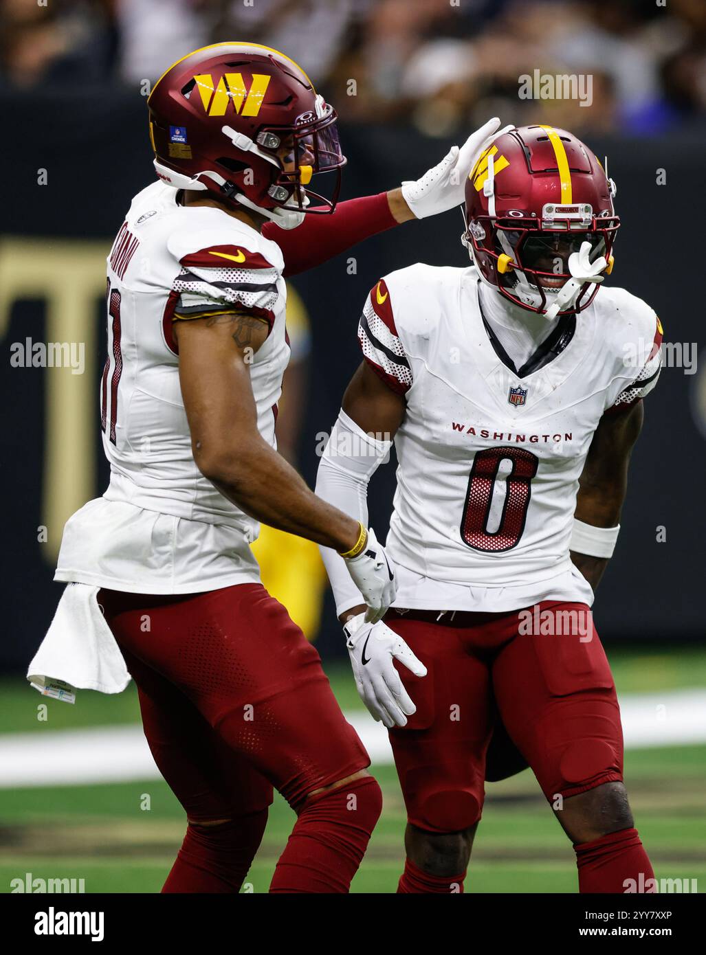 Washington Commanders cornerback Mike Sainristil (0) celebrates the ...