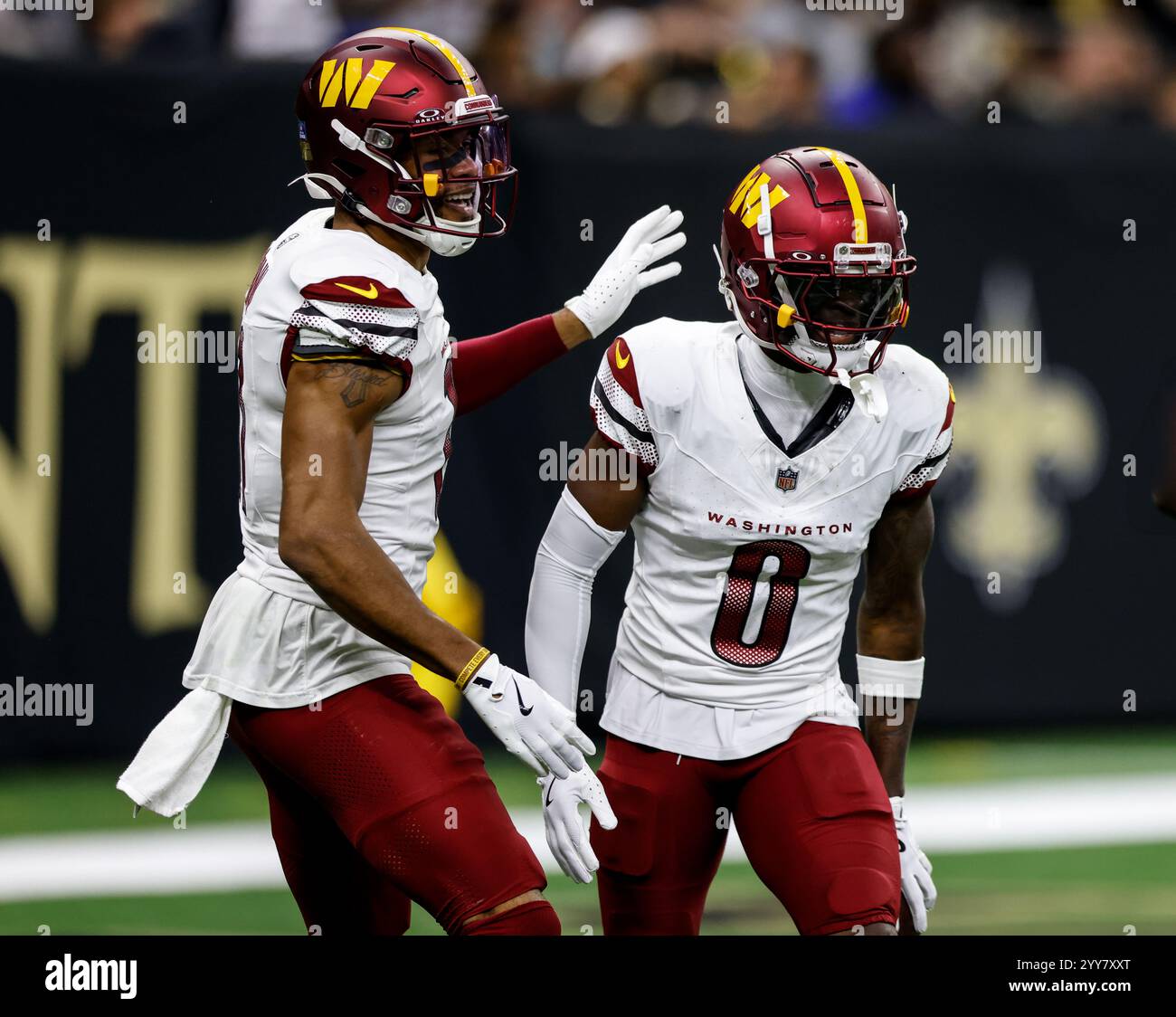 Washington Commanders cornerback Mike Sainristil (0) celebrates the ...