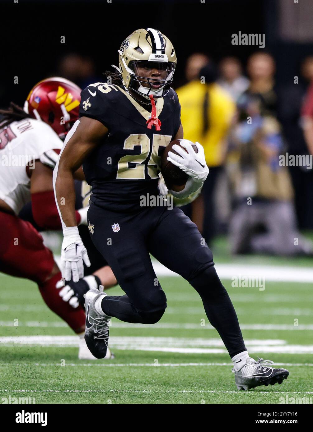 New Orleans Saints running back Kendre Miller (25) with the carry at ...