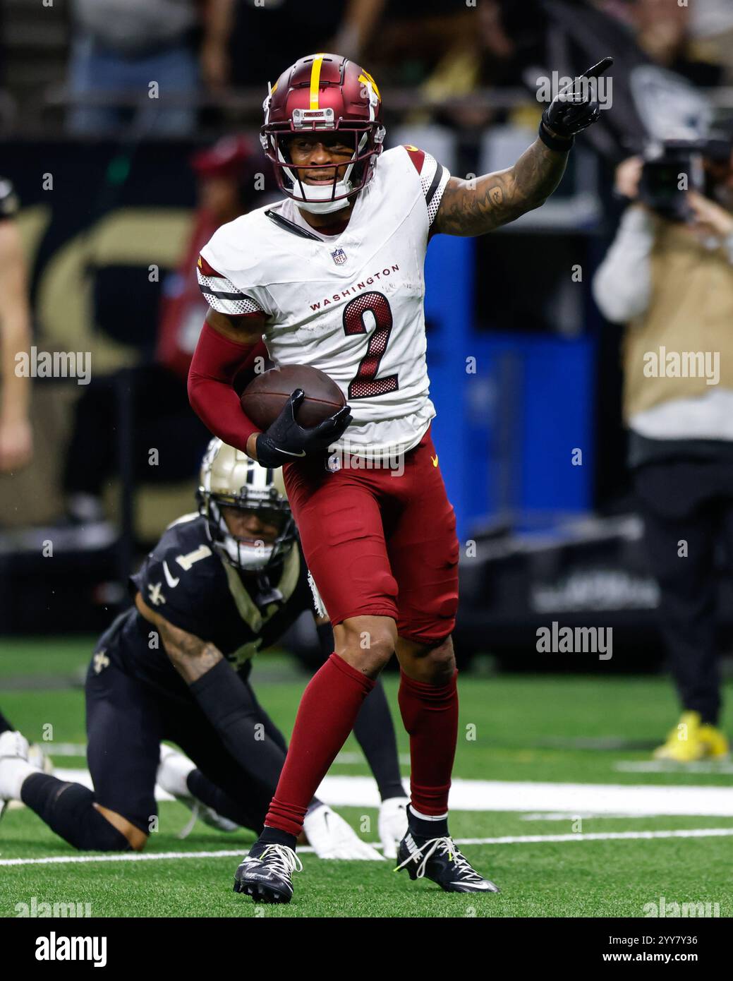 Washington Commanders wide receiver Dyami Brown (2) signals for the ...