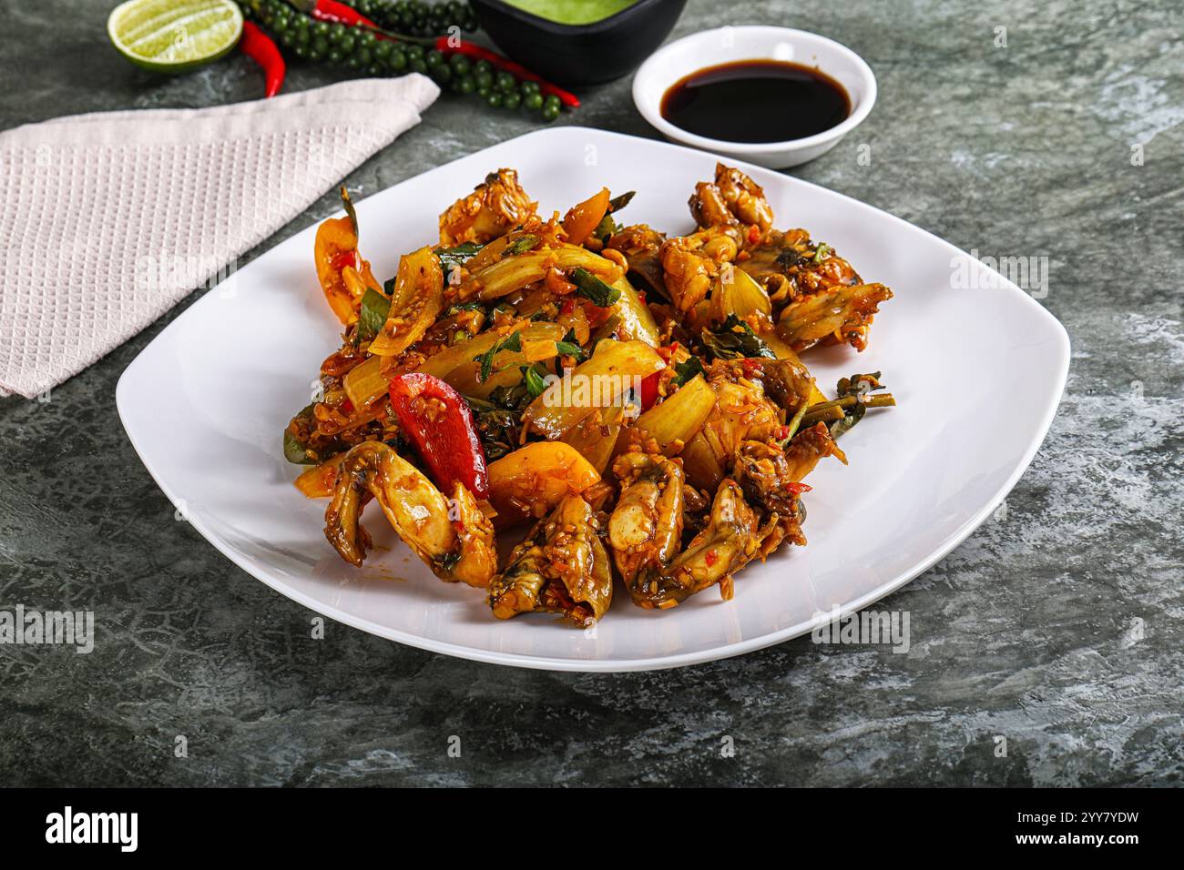 Vietnamese cuisine - fried frog with vegetables and spices Stock Photo ...