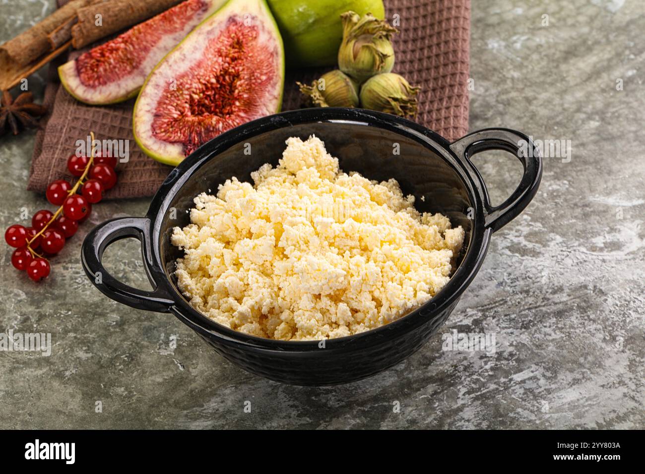 Delicous sheep cottage cheese curd served fig Stock Photo - Alamy