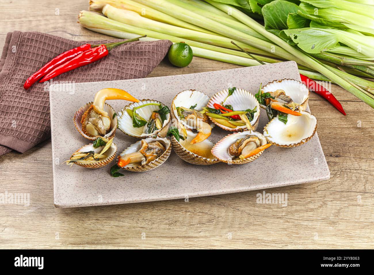 Delicous Asian mollusk shell steamed with spices Stock Photo - Alamy