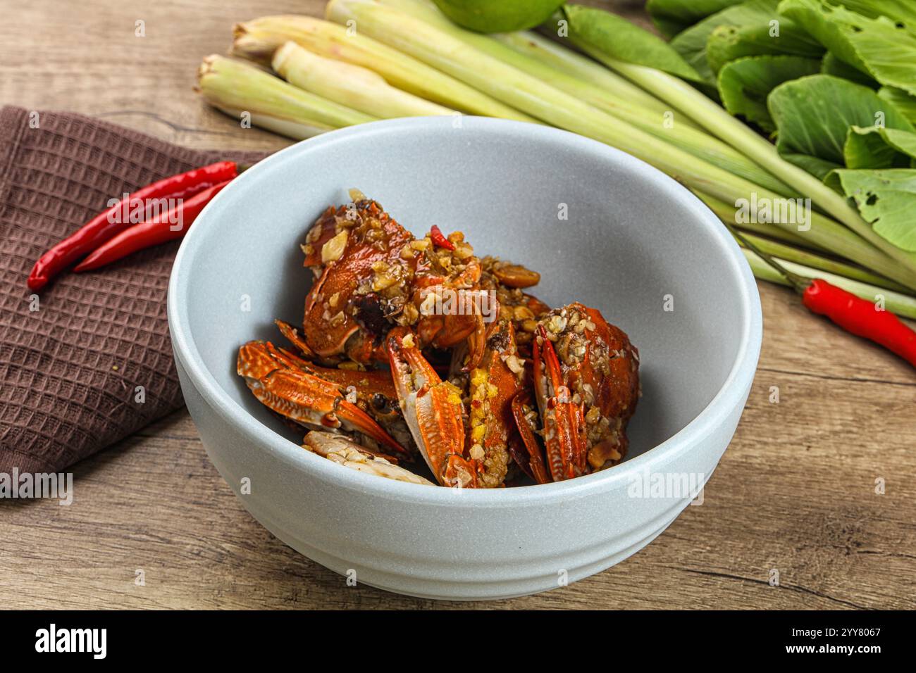 Tasty Steamed Spider crab Claws in tamatind sauce Stock Photo - Alamy