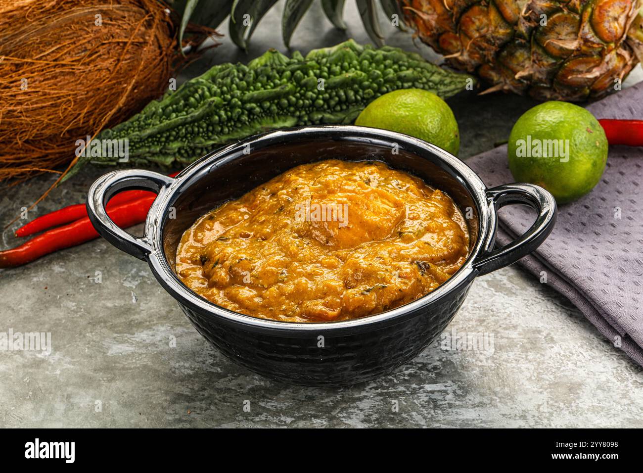 Indian cuisne - Chicken massala with sauce and spices Stock Photo - Alamy